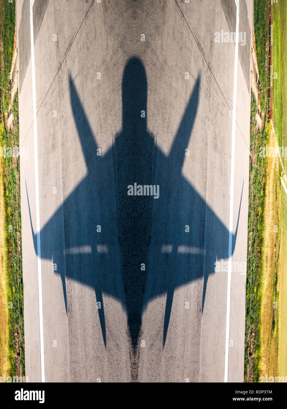 Abstract futuristic military plane shadow on the airport tarmac in ...