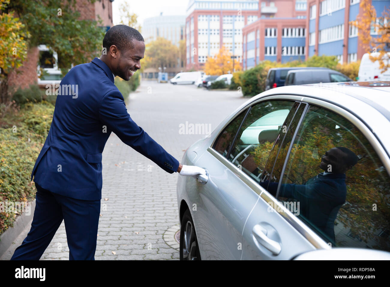 Man Opening Car Door