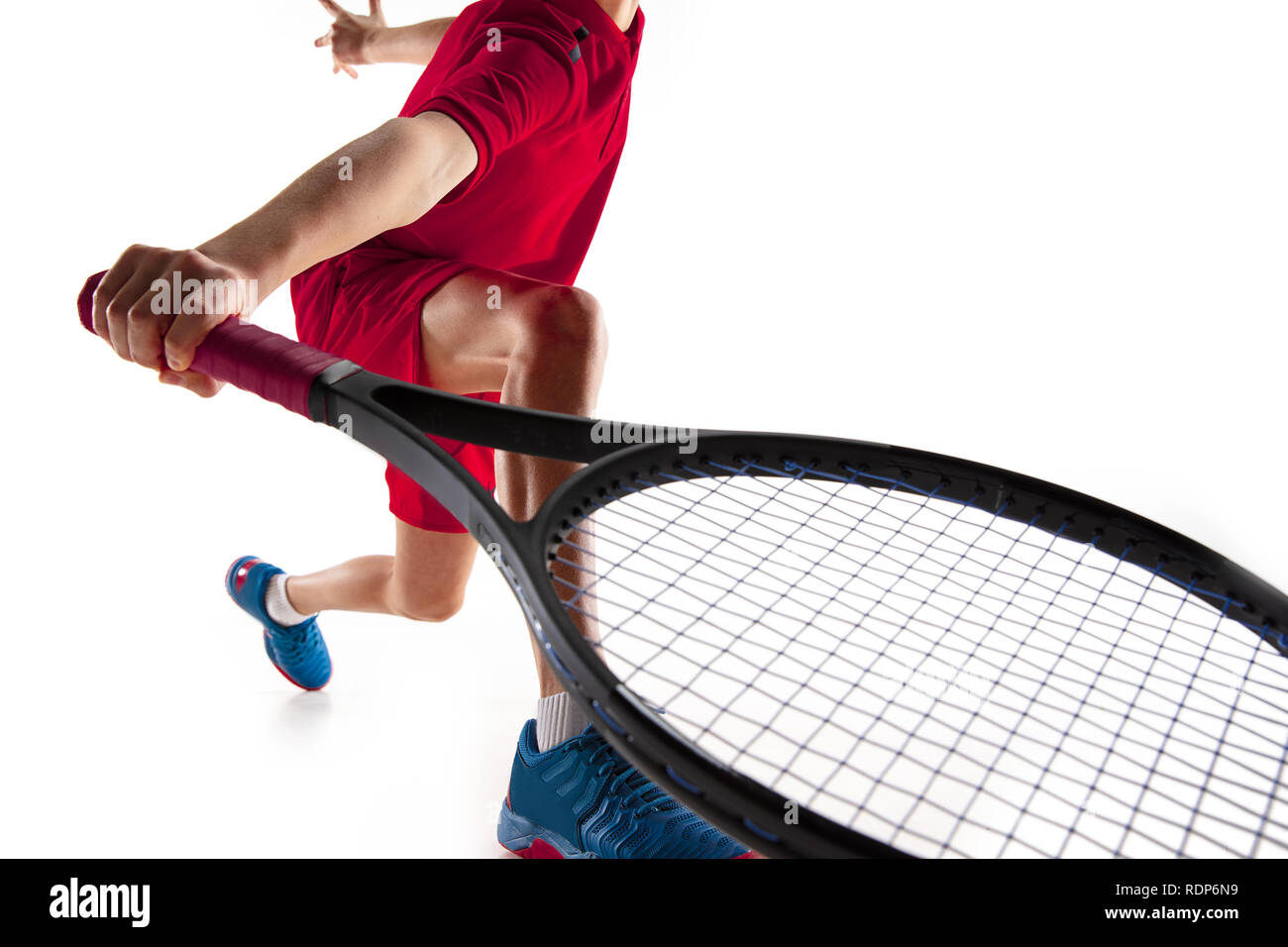 Young teen boy tennis player in motion or movement isolated on white ...