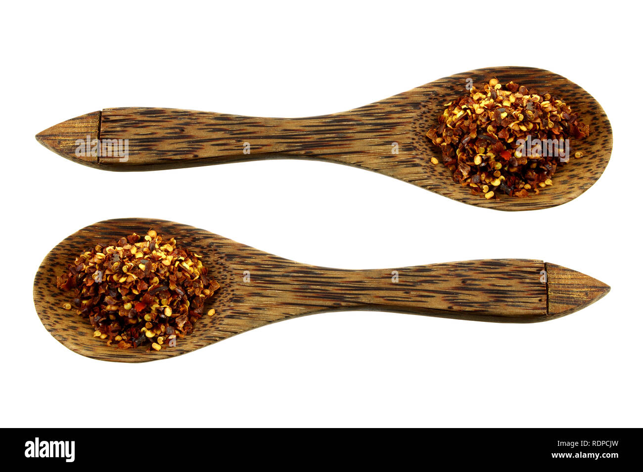Wooden Spoons with Chilli Flakes with White Background Stock Photo - Alamy