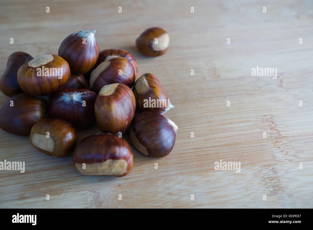Raw chestnuts hi-res stock photography and images - Alamy