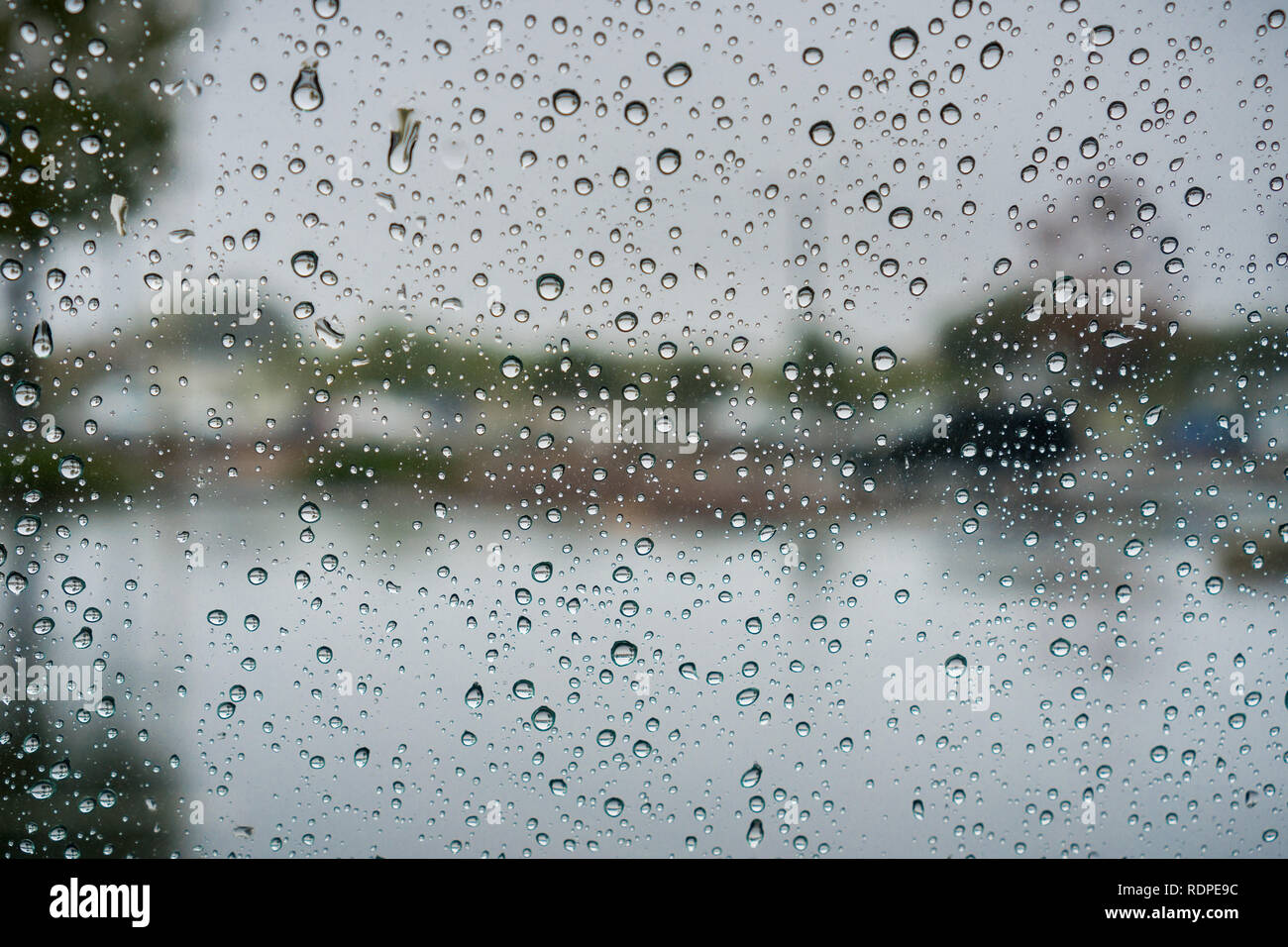 Rainy weather landscape through window hi-res stock photography and ...