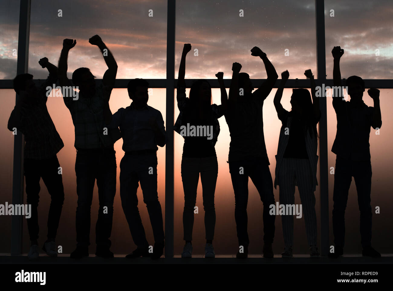happy business team standing by the window .photo with copy space Stock ...