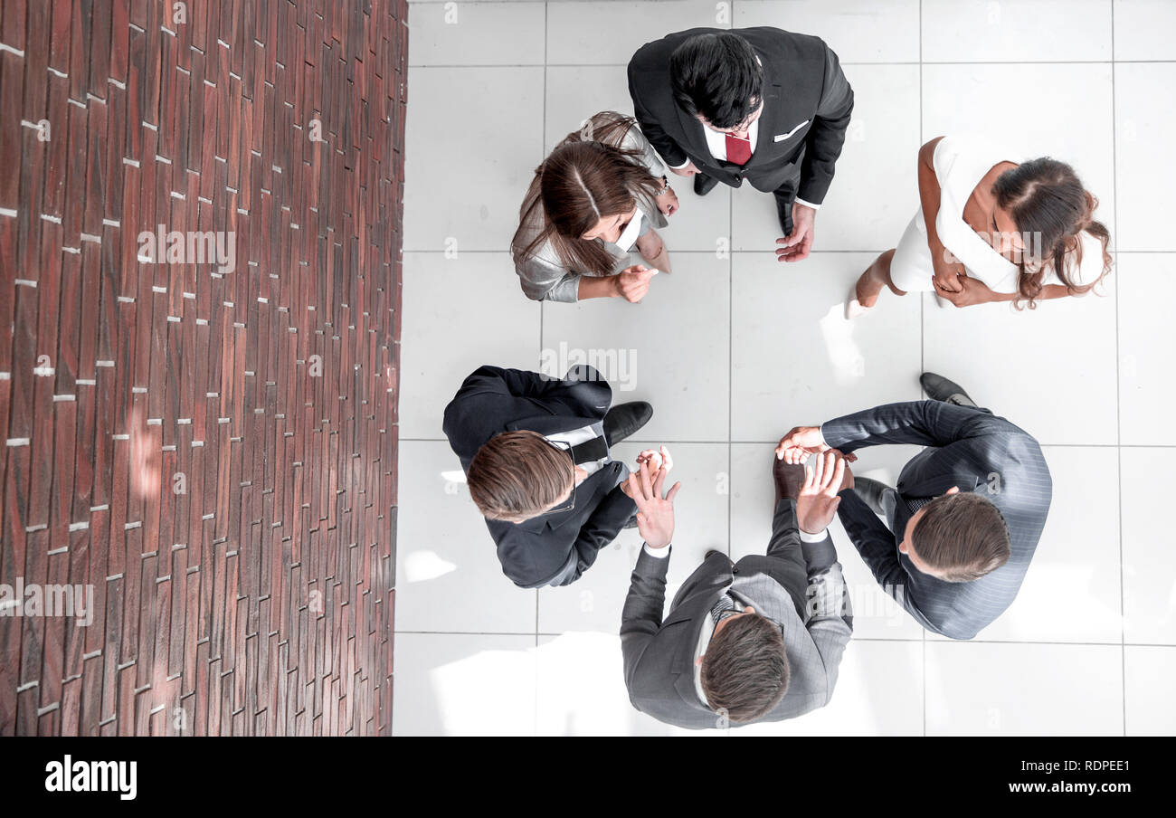 top view. business team solving work problems.the concept of teamwork ...