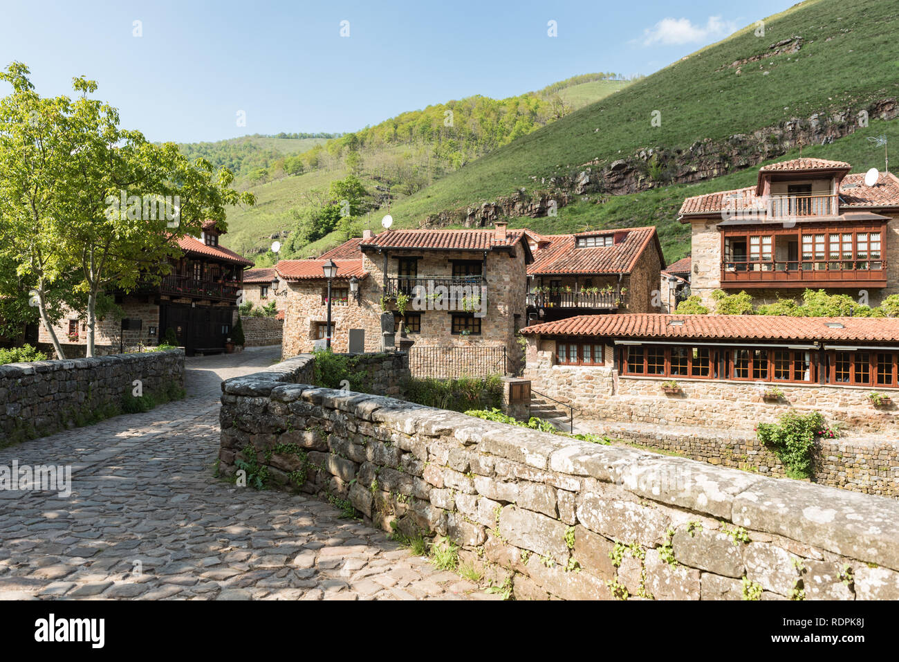 Barcena Mayor, Cabuerniga valley, with typical stone houses is one of ...