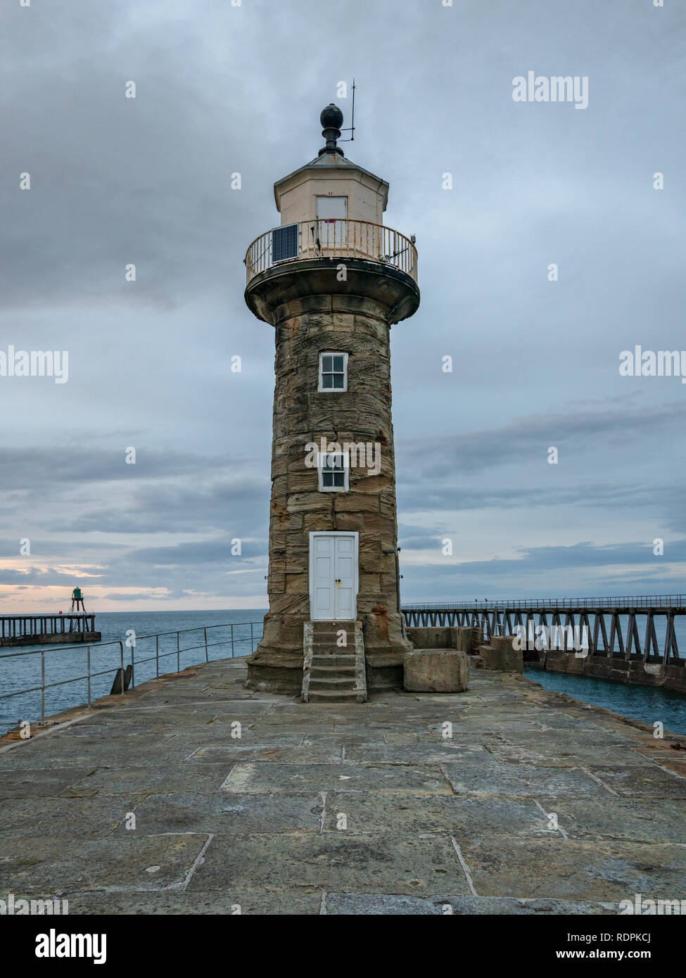The East Pier Lighthouse in Whitby, North Yorkshire, England, UK Stock ...