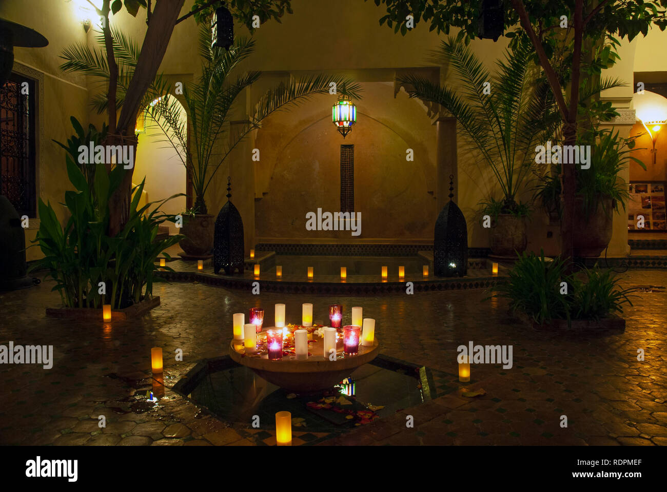 The interior courtyard of a traditional Moroccan riad, Marrakech ...
