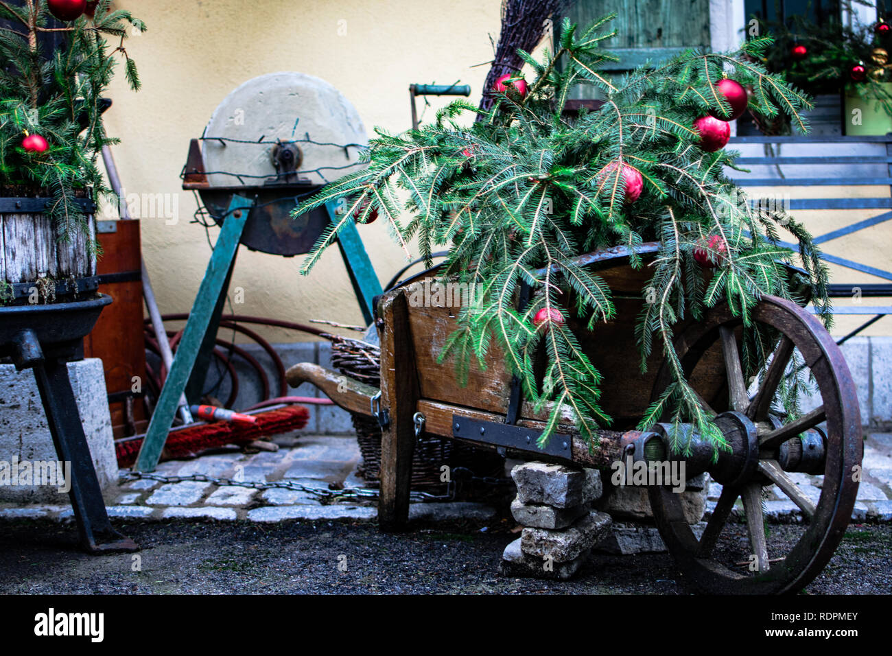 Antique wheelbarrow hi-res stock photography and images - Alamy