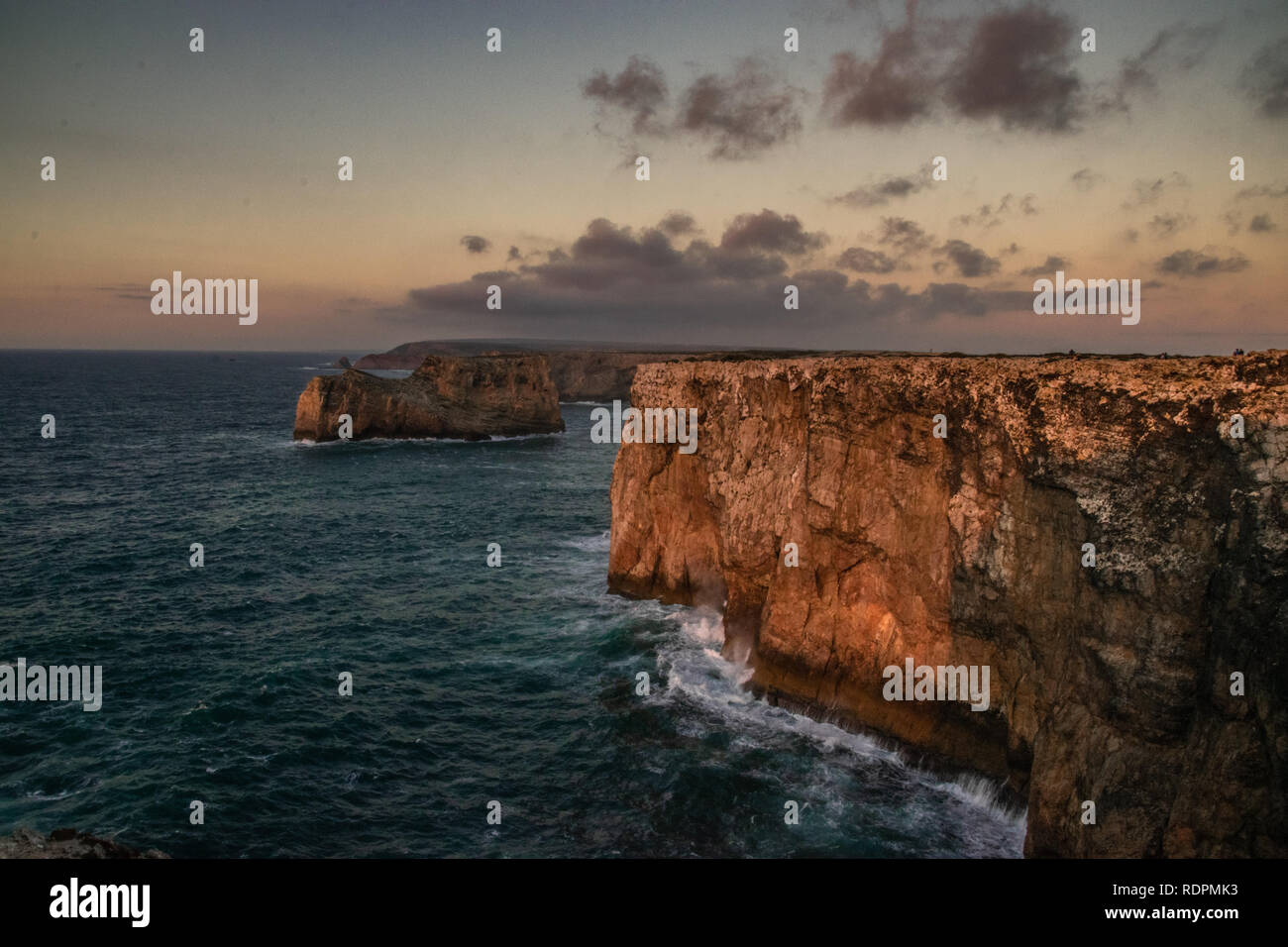 Sunset at the cliff Stock Photo - Alamy