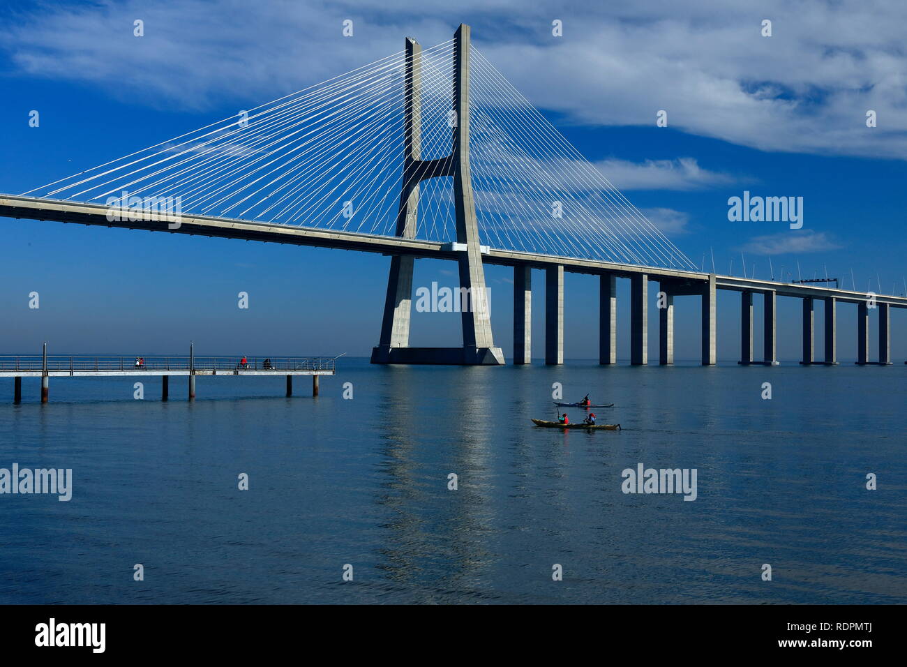 The Vasco da Gama Bridge is a cable-stayed bridge flanked by viaducts ...