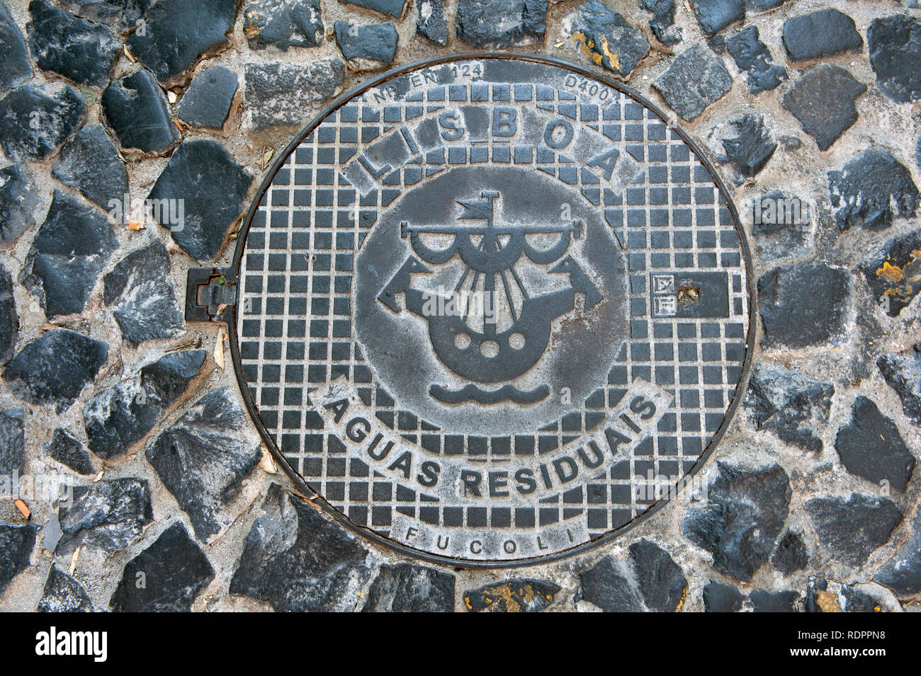 Street water valve cover hi-res stock photography and images - Alamy