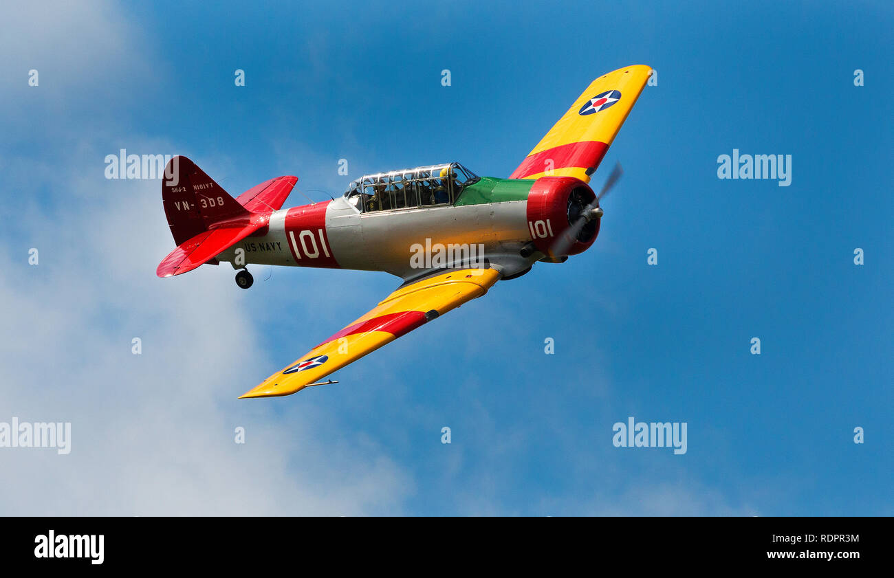 North American SNJ-4 a Navy trainer from World War II Flying in air ...