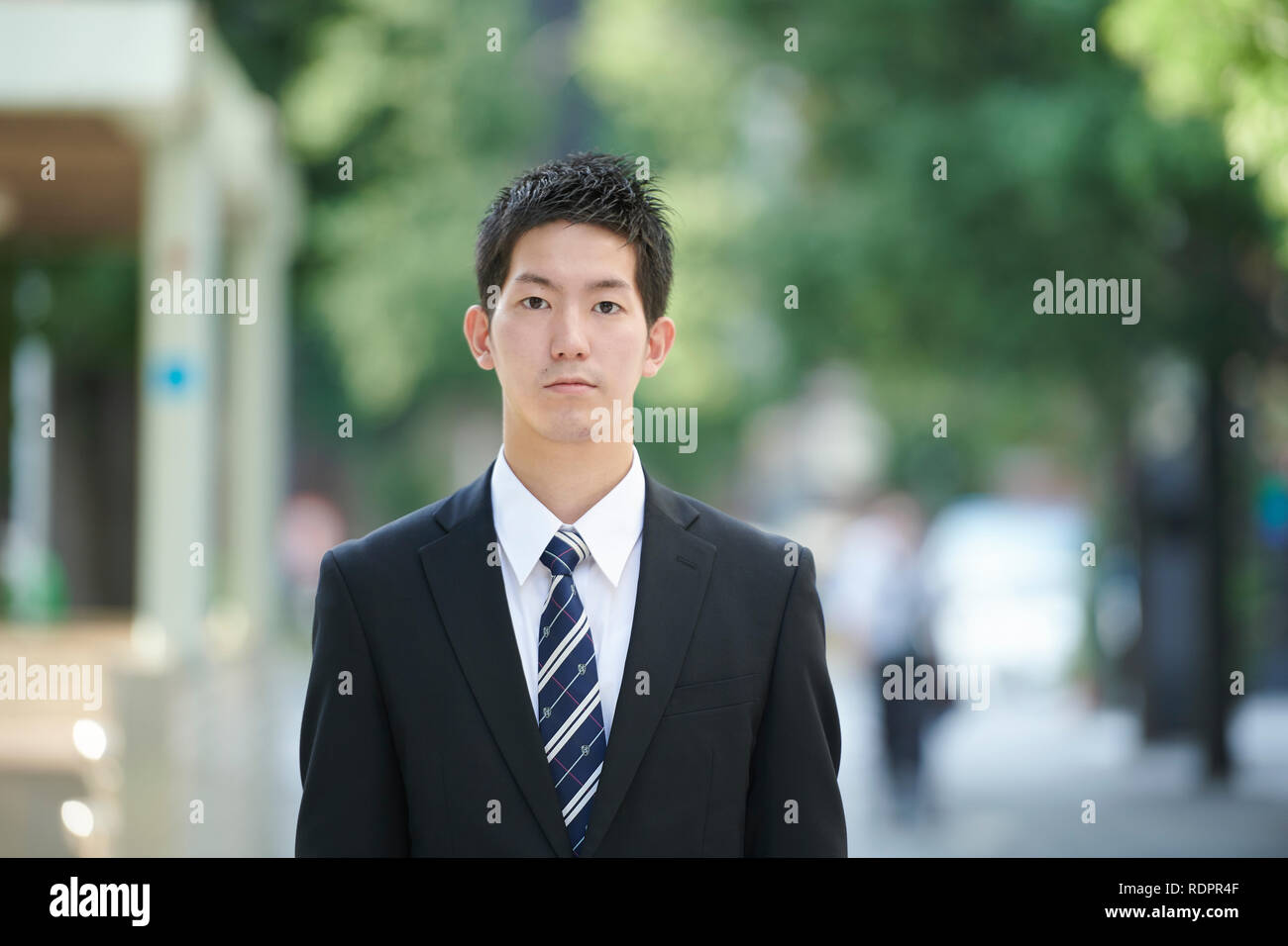 Young Japanese businessman Stock Photo - Alamy