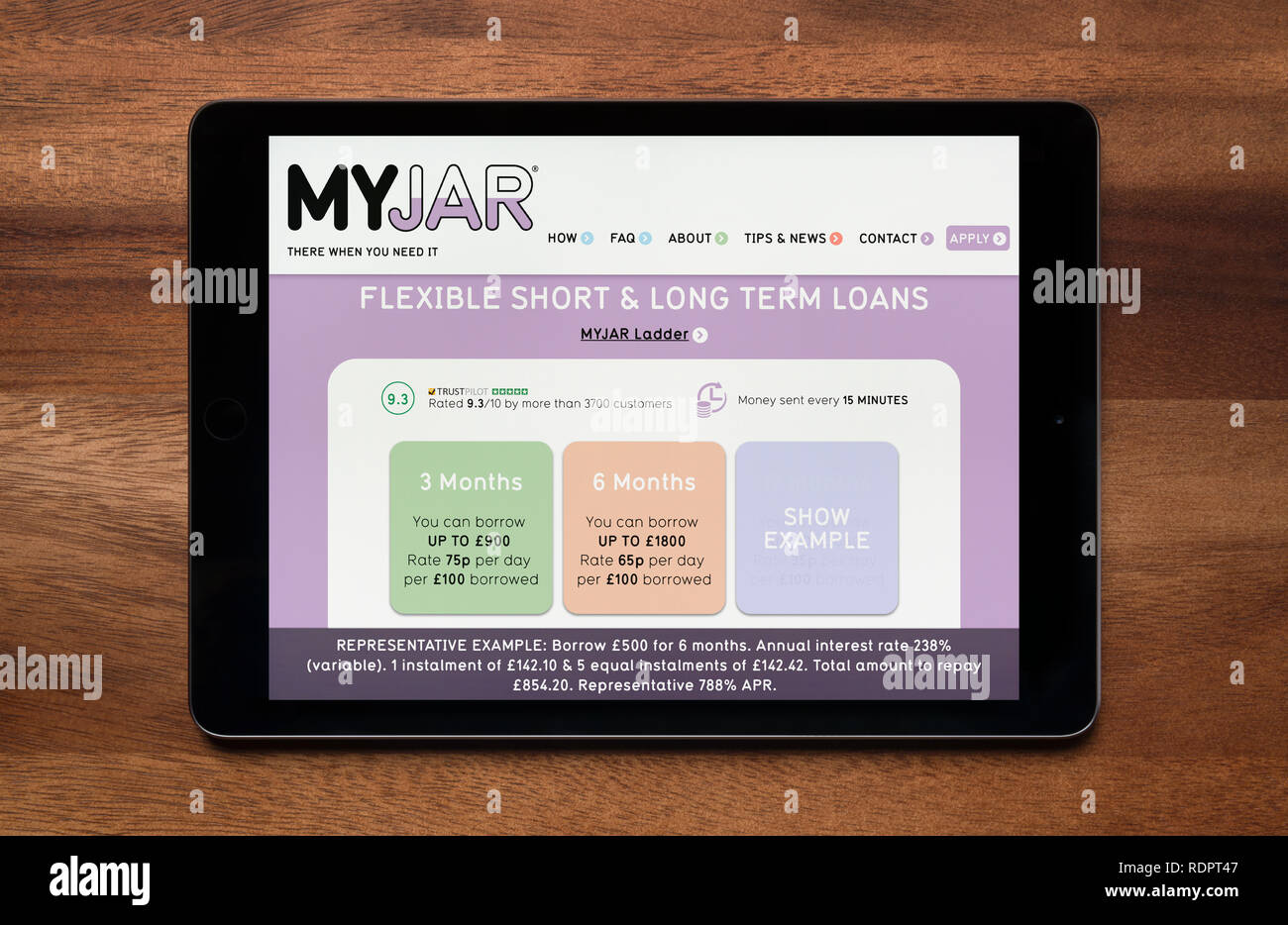 The website of MyJar is seen on an iPad tablet, which is resting on a ...