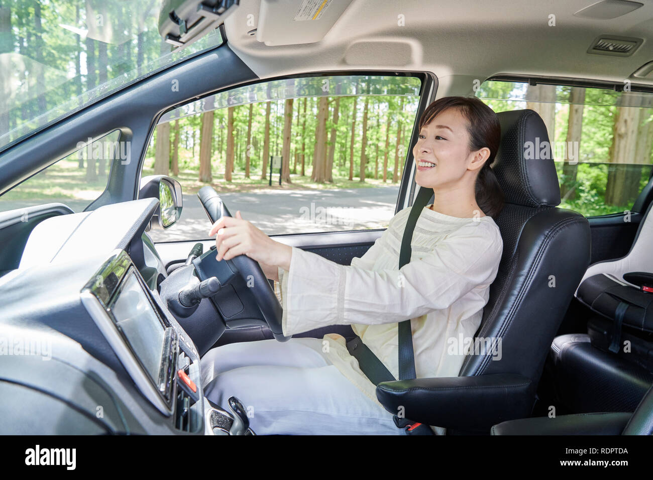 Japanese woman in the car Stock Photo - Alamy