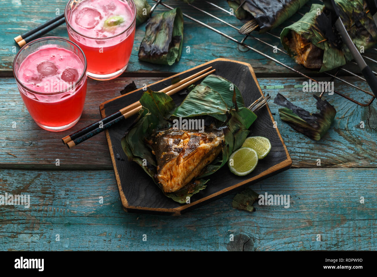 Grilled stingray wing or sambal stingray in leaf with lime and spicy ...