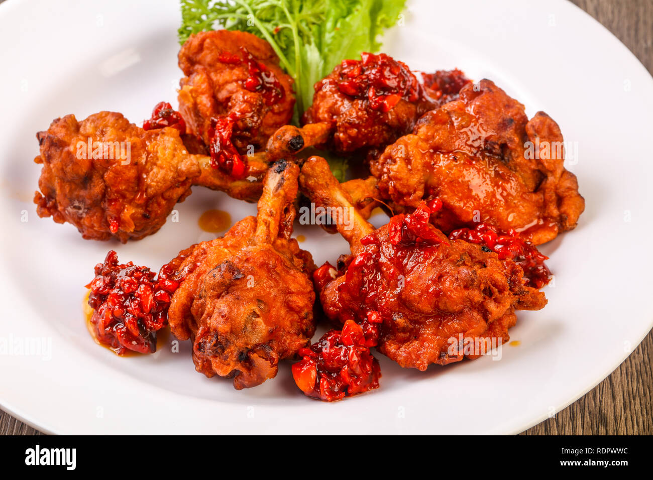 Indian traditional cuisine - Chicken lollipops with spices Stock Photo ...