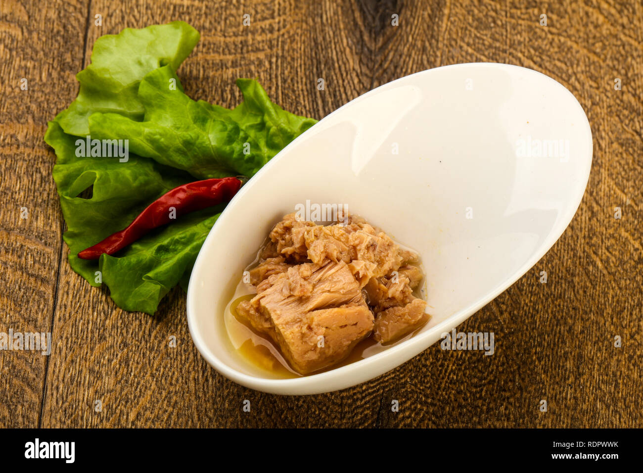 Canned tuna fish in the bowl ready for cooking Stock Photo - Alamy
