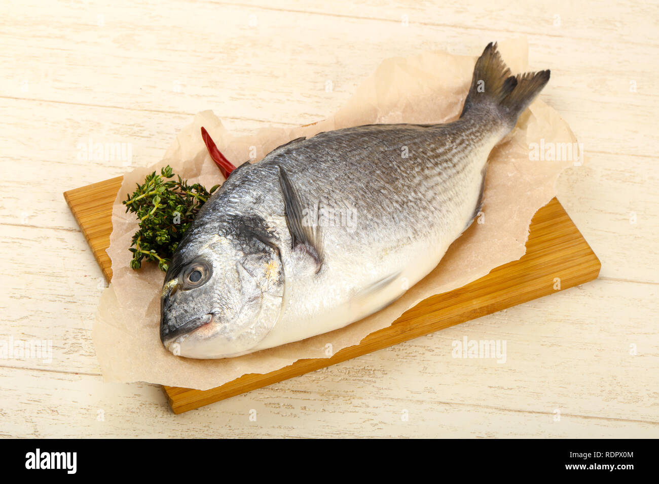 raw dorada fish - ready for cooking Stock Photo - Alamy