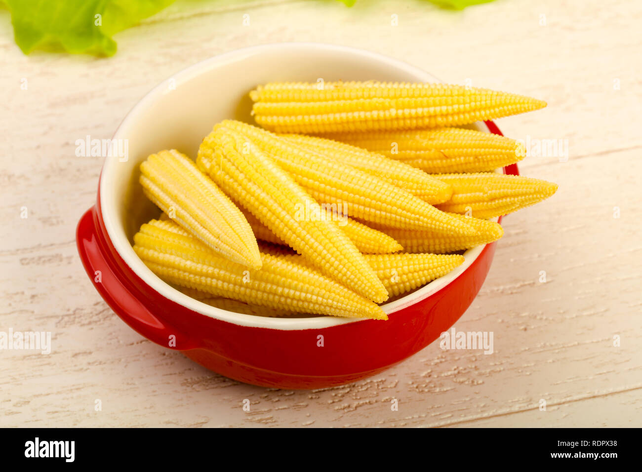 Young raw baby corn Stock Photo - Alamy