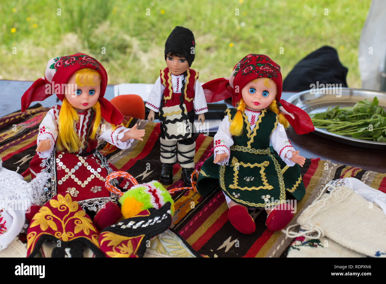 Variety of traditional bulgarian souvenir dolls in national costumes on ...