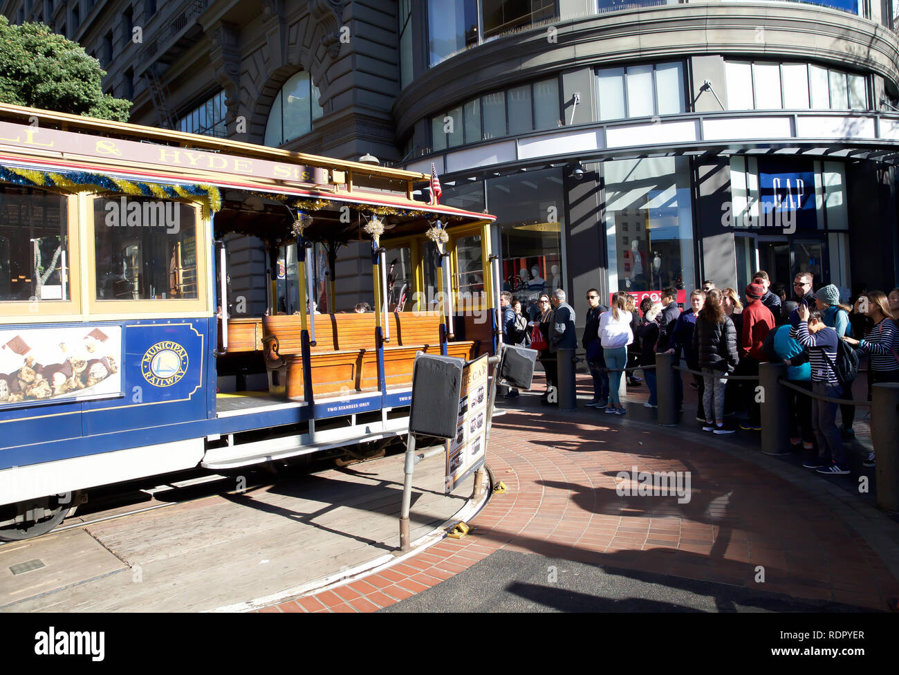 People queue around the block for a ride on the world famous San ...