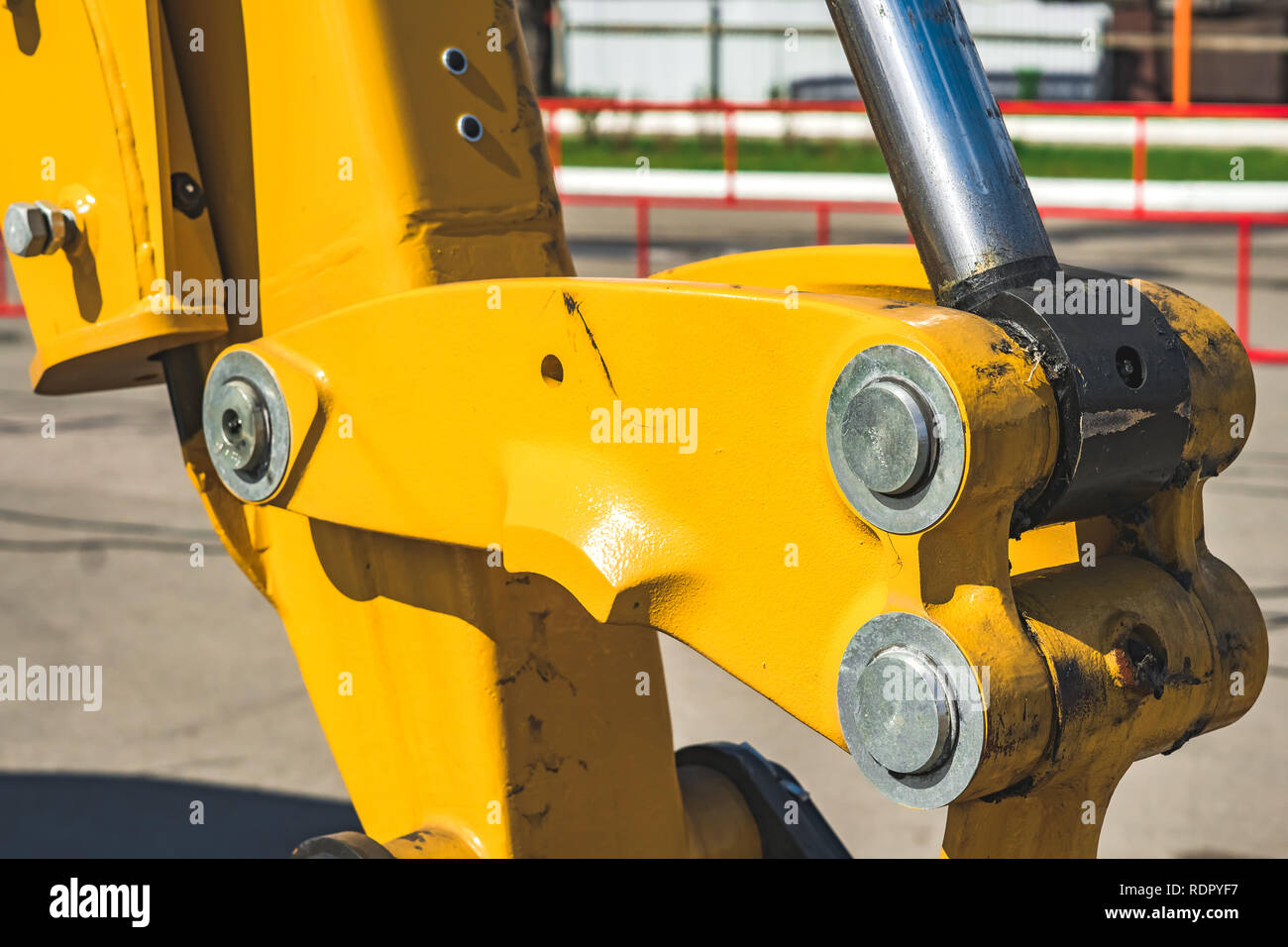 The hydraulic tractor is yellow. Crawler bulldozer at the exhibition ...