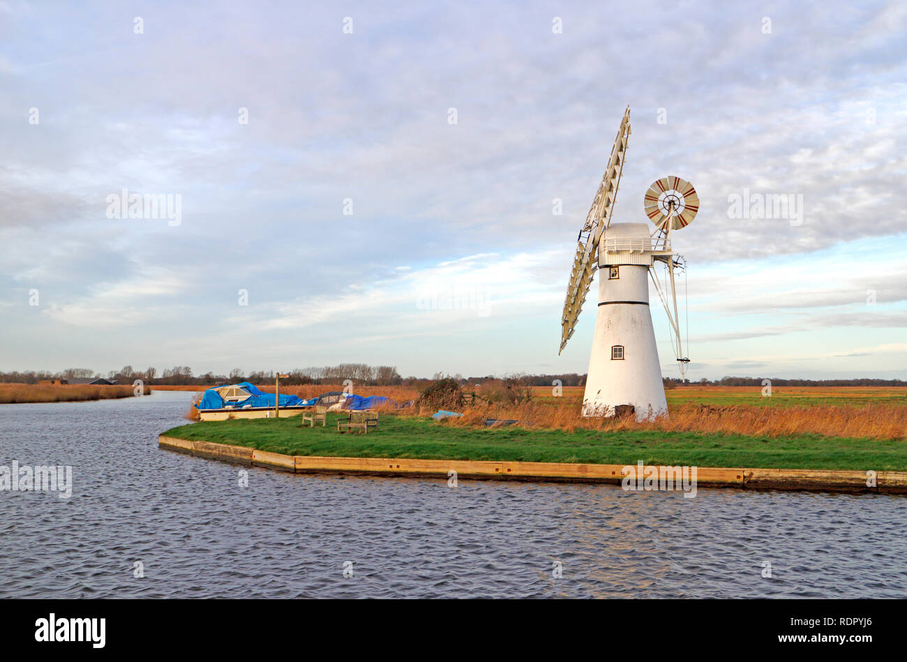 A landscape with Thurne Dyke Drainage Mill by the River Thurne on the ...