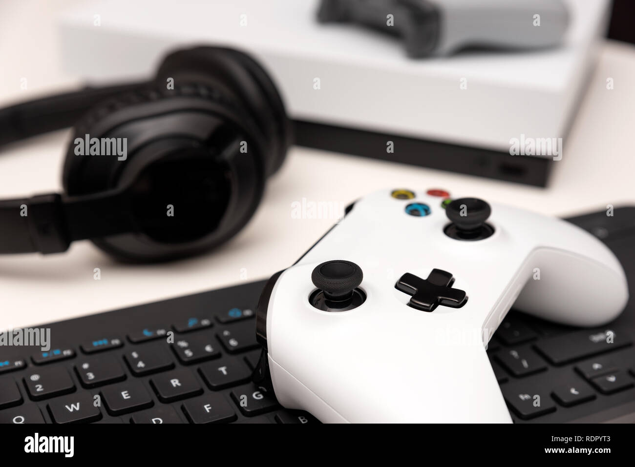 Gaming console and wireless controllers. Video game concept Stock Photo ...