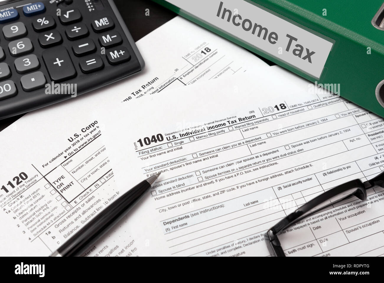 U.S. Individual income tax return. USA tax forms on desk Stock Photo ...