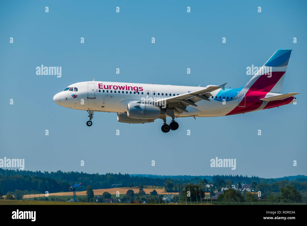 Eurowings airlines airplane preparing for landing at day time in ...