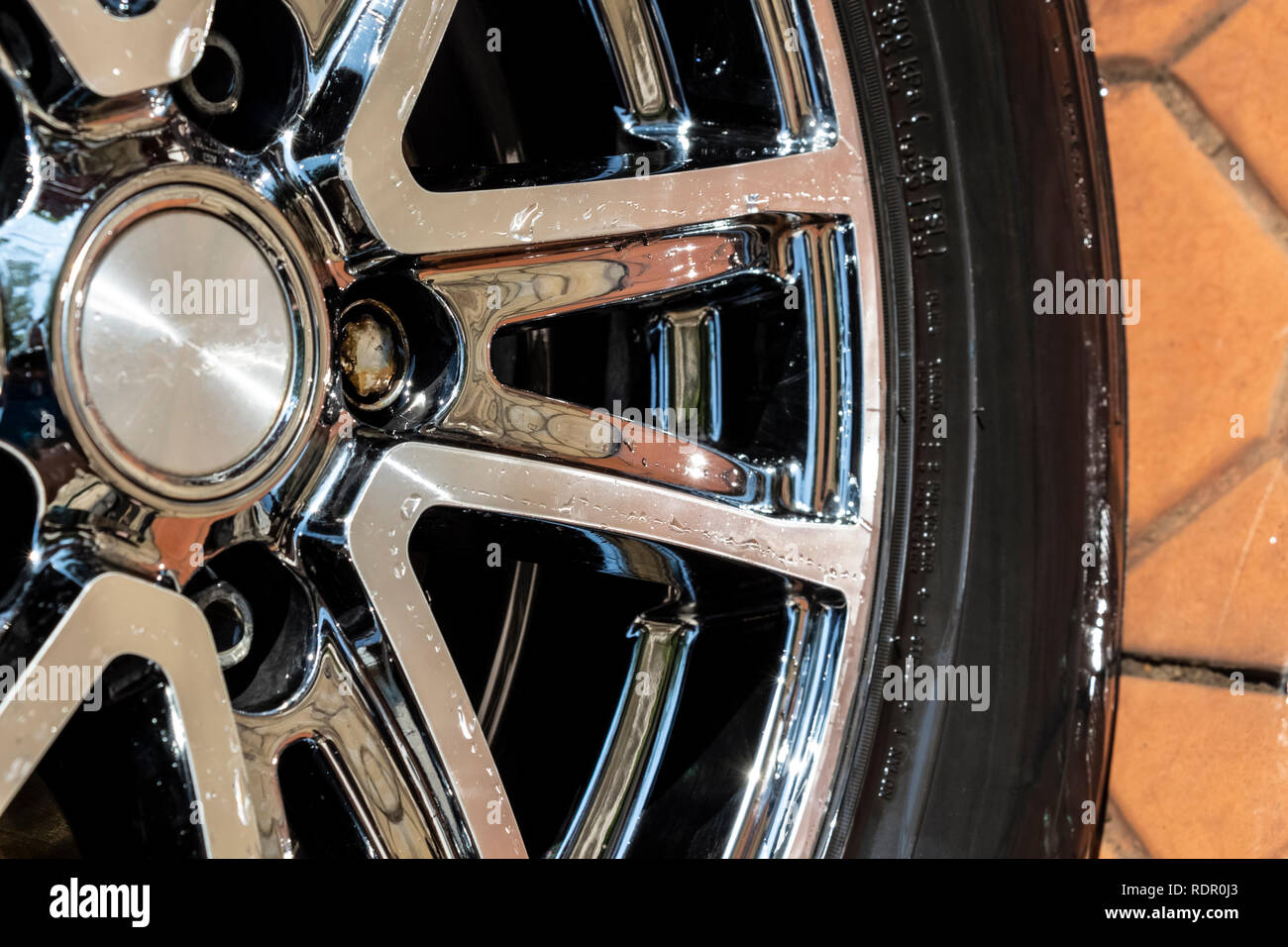 Chrome modern car wheel close-up after washing Stock Photo - Alamy