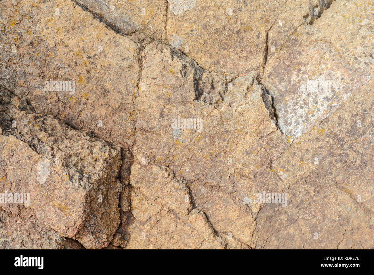 Natural stone mountain texture brown cracked background Stock Photo - Alamy