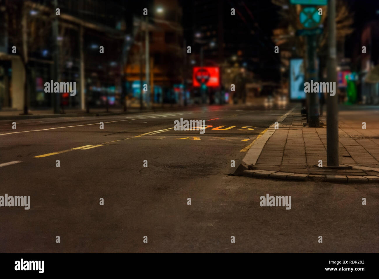 Night street scene with illuminated building architecture Stock Photo ...