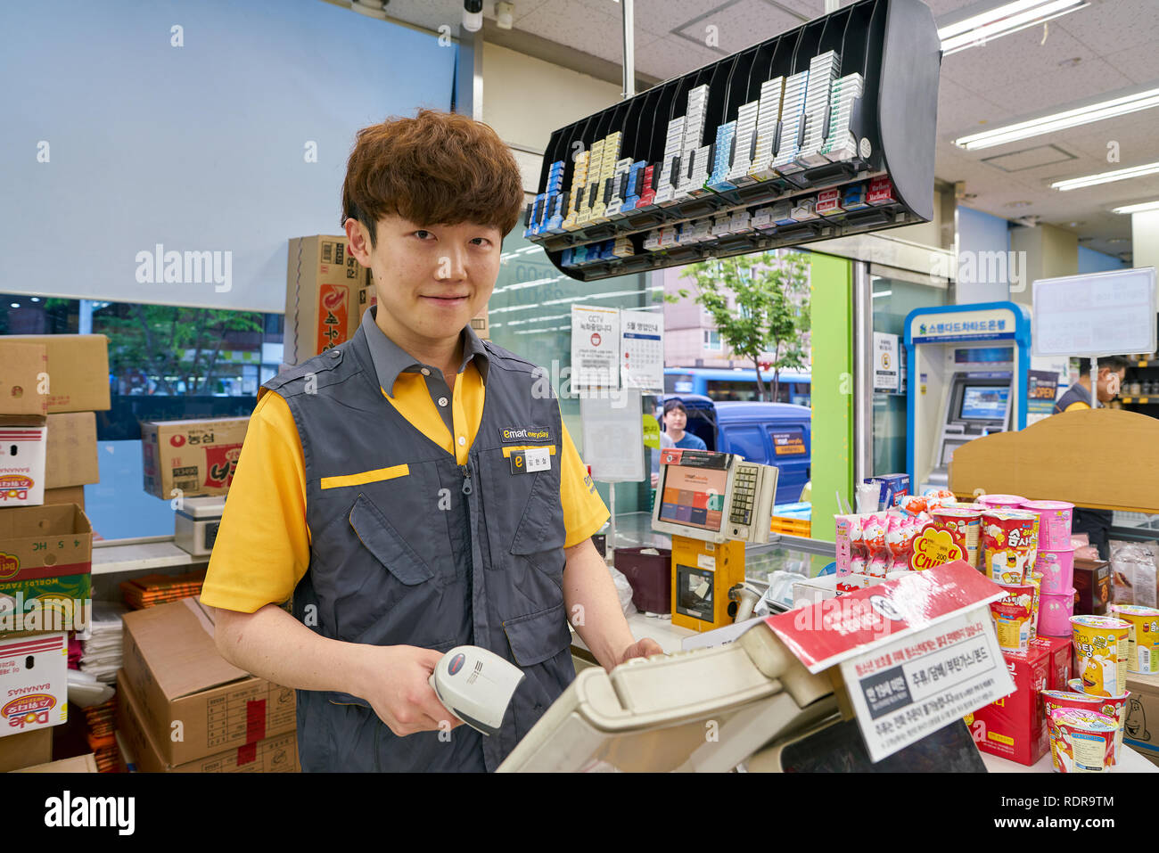 SEOUL, SOUTH KOREA - CIRCA MAY, 2017: worker at a grocery store in ...