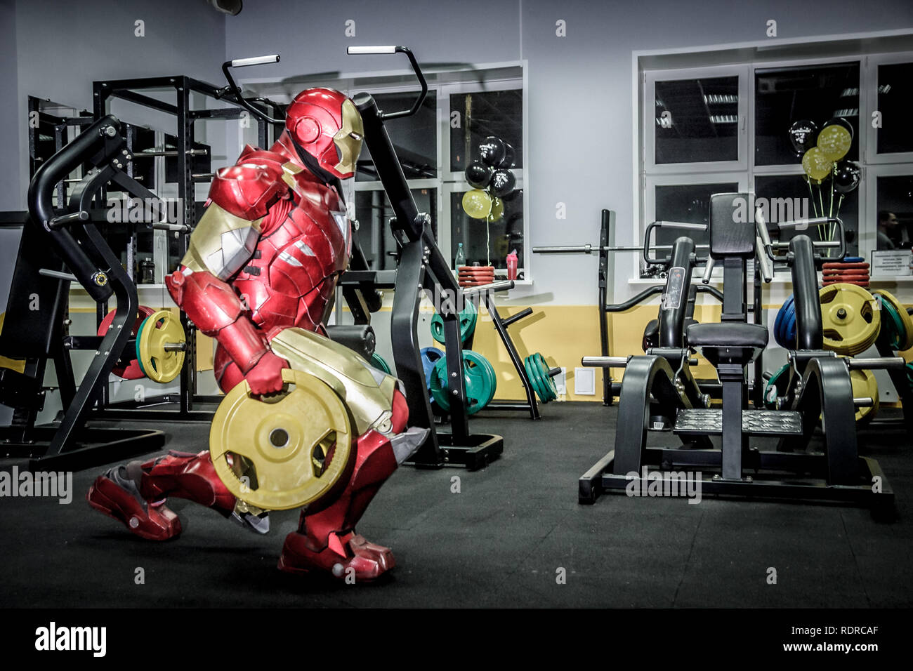 Animators iron man and spider-man in the fitness room at a corporate ...