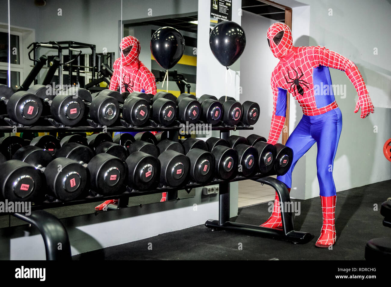 Animators iron man and spider-man in the fitness room at a corporate ...