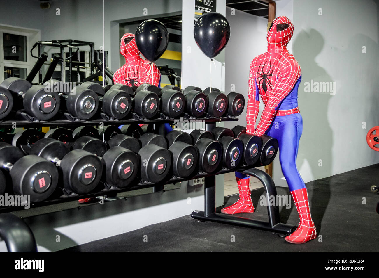 Animators iron man and spider-man in the fitness room at a corporate ...