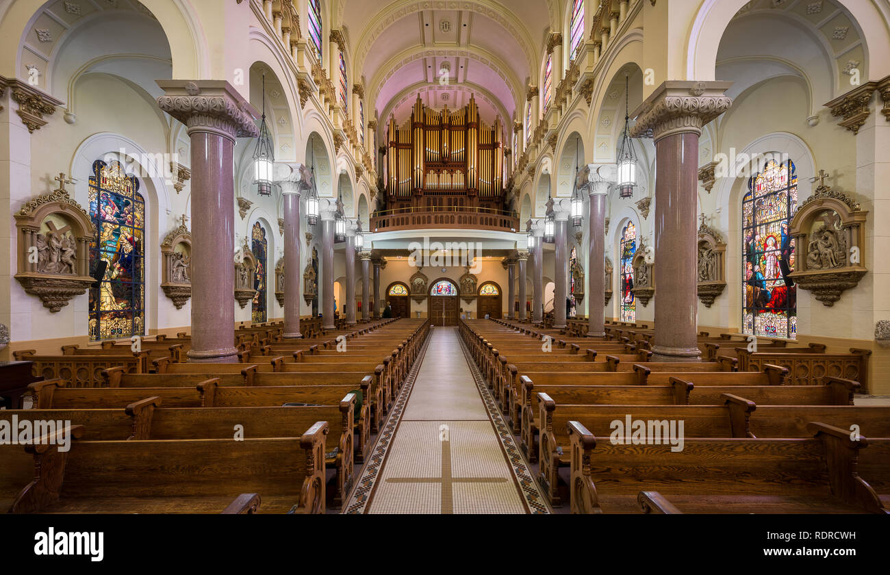 Pipe organ and nave inside the Sacred Heart Catholic Church in downtown ...