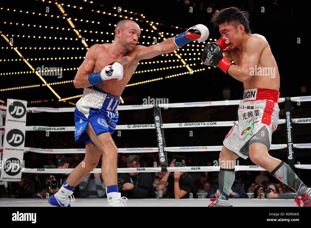 New York, New York, USA. 18th Jan, 2019. TJ DOHENY (blue trunks ...