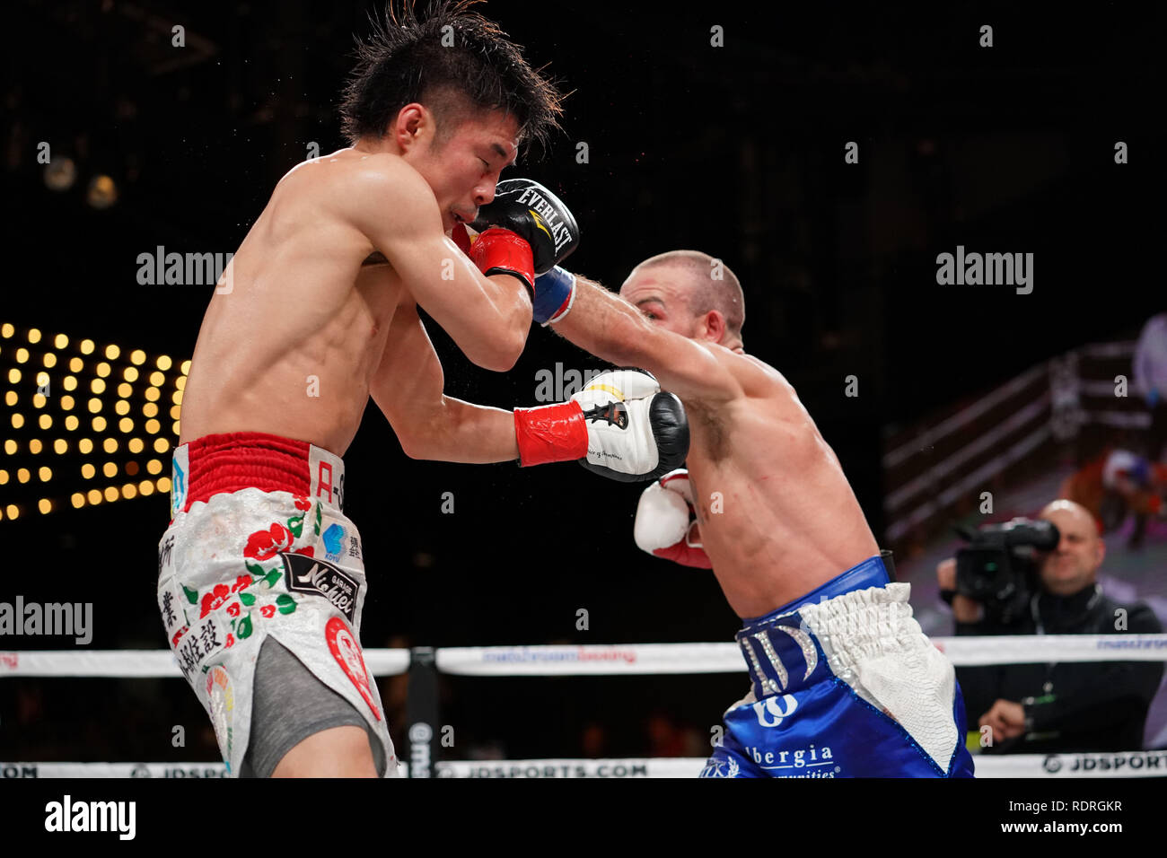 New York, New York, USA. 18th Jan, 2019. TJ DOHENY (blue trunks ...
