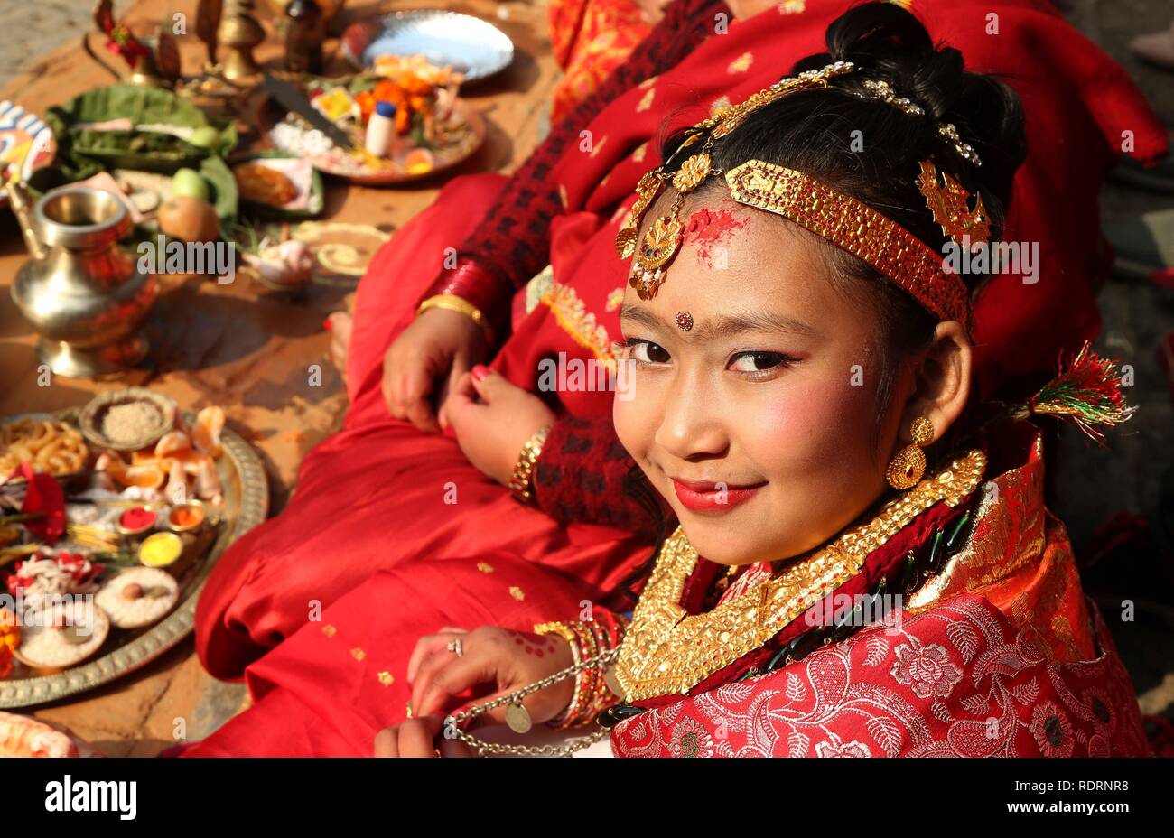 Kathmandu, Nepal. 19th Jan, 2019. A girl from Newar community attends a ...