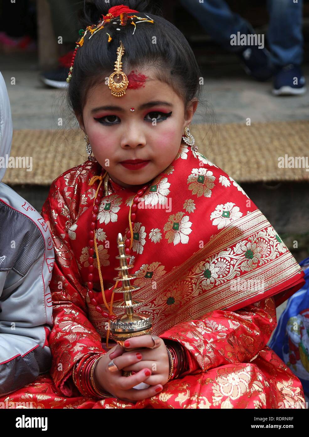 Kathmandu, Nepal. 19th Jan, 2019. A girl from Newar community attends a ...