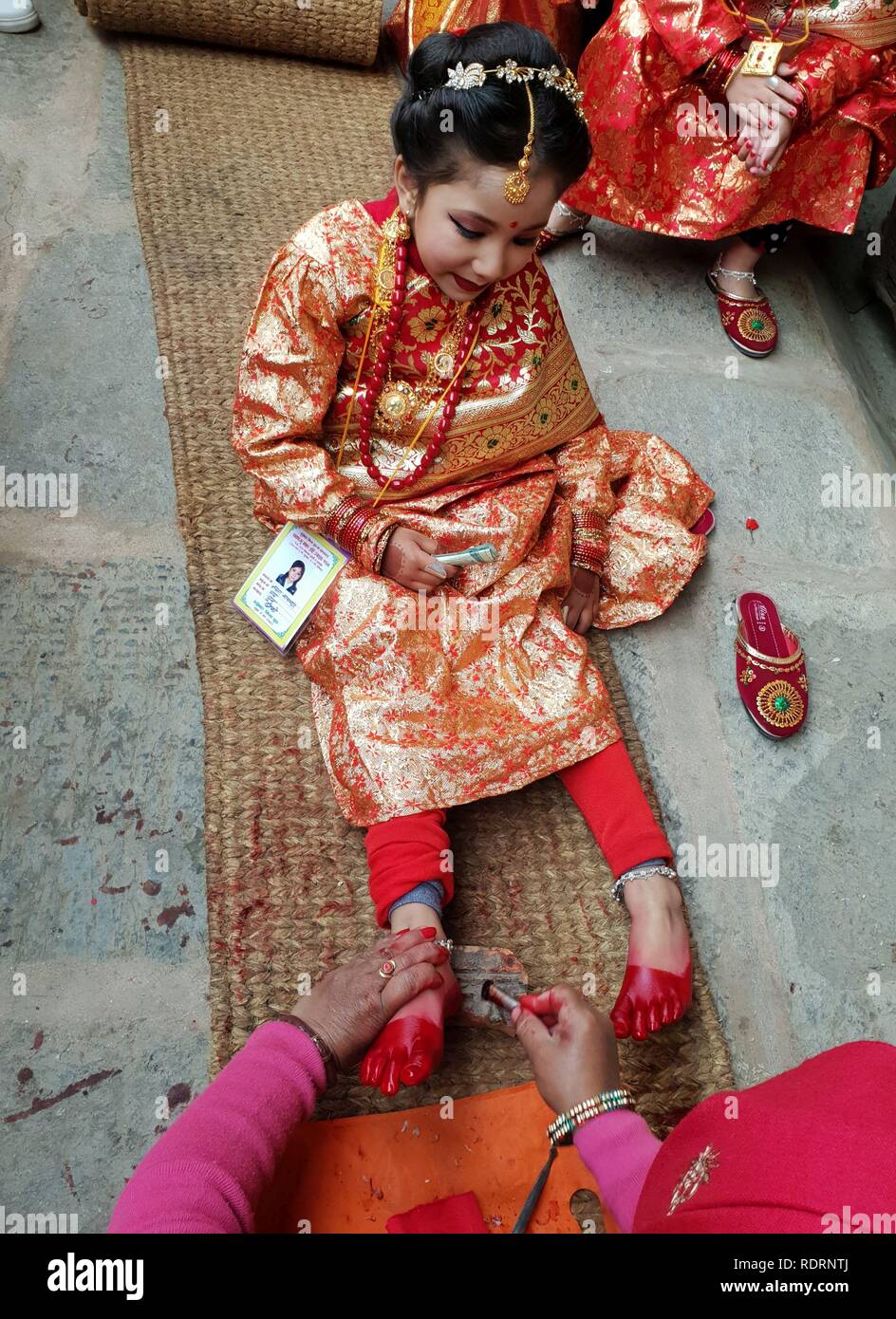 Kathmandu, Nepal. 19th Jan, 2019. A girl from Newar community gets ...