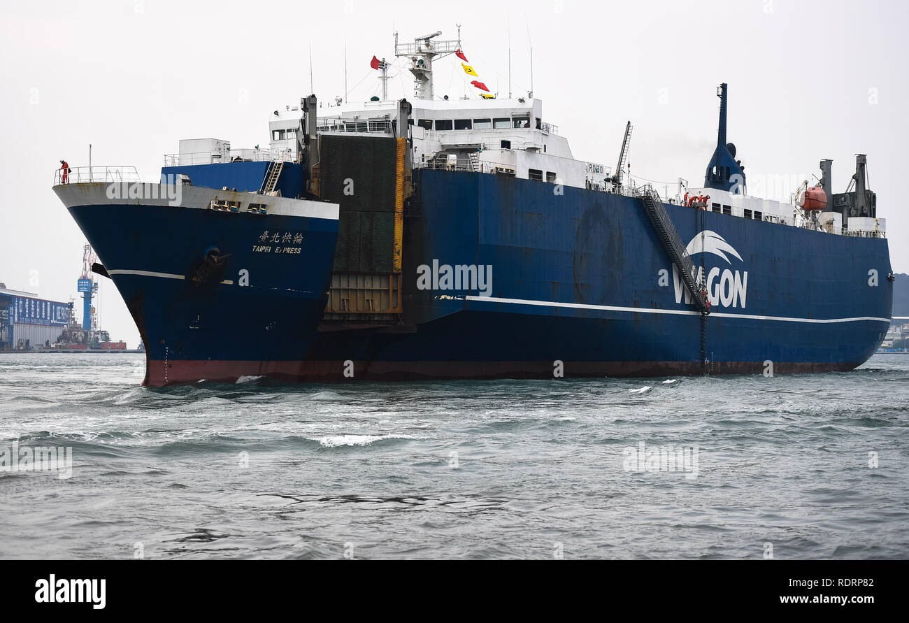 Taipei. 19th Jan, 2019. A freighter departs from a port in Kaohsiung of ...