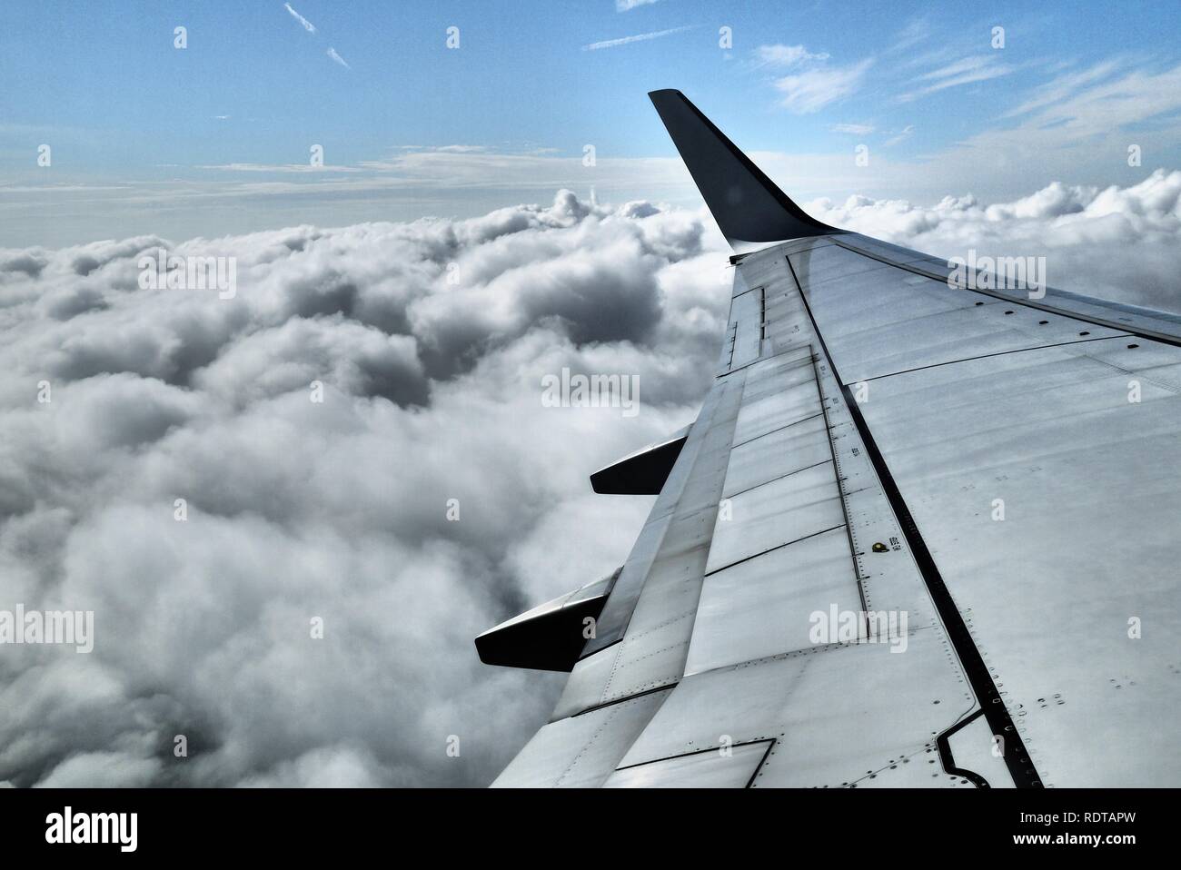 Cloudy sky view captured from a airplane window Stock Photo - Alamy