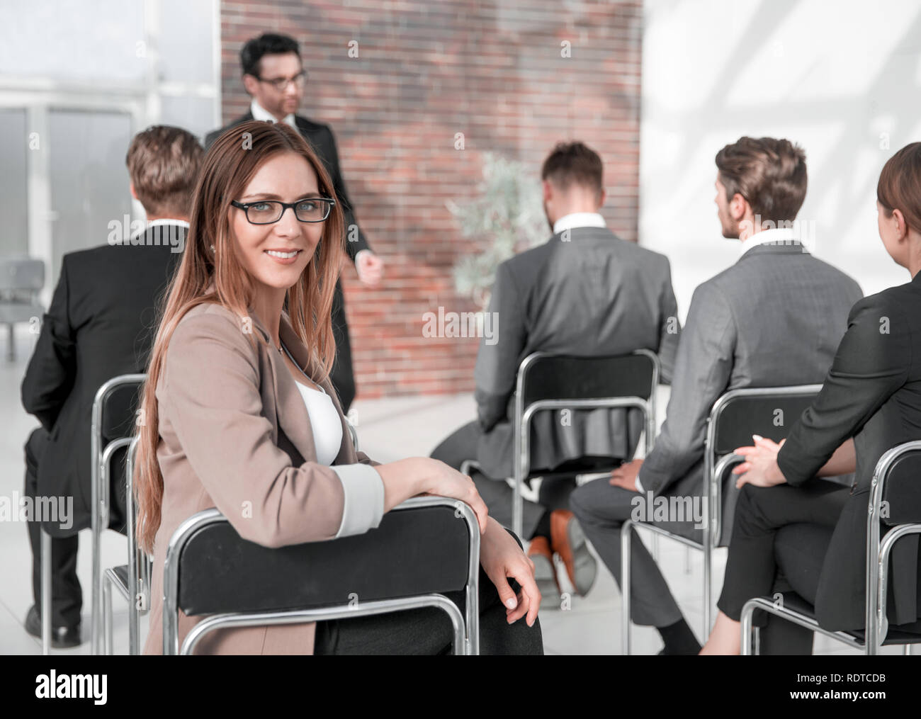 business woman with her staff, people group in background at modern ...