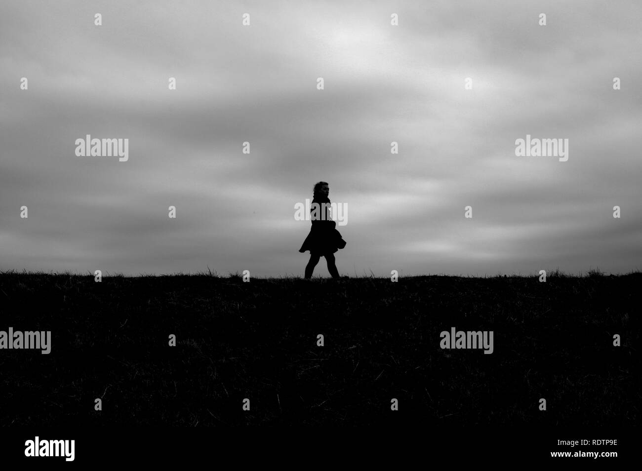 Dark Road Woman Silhouette Black and White Stock Photos & Images - Alamy