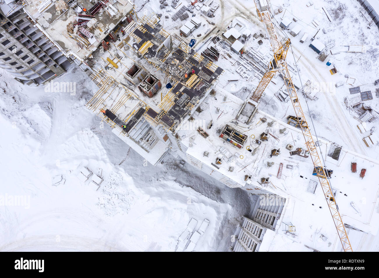aerial top view of construction site in winter. building of new ...