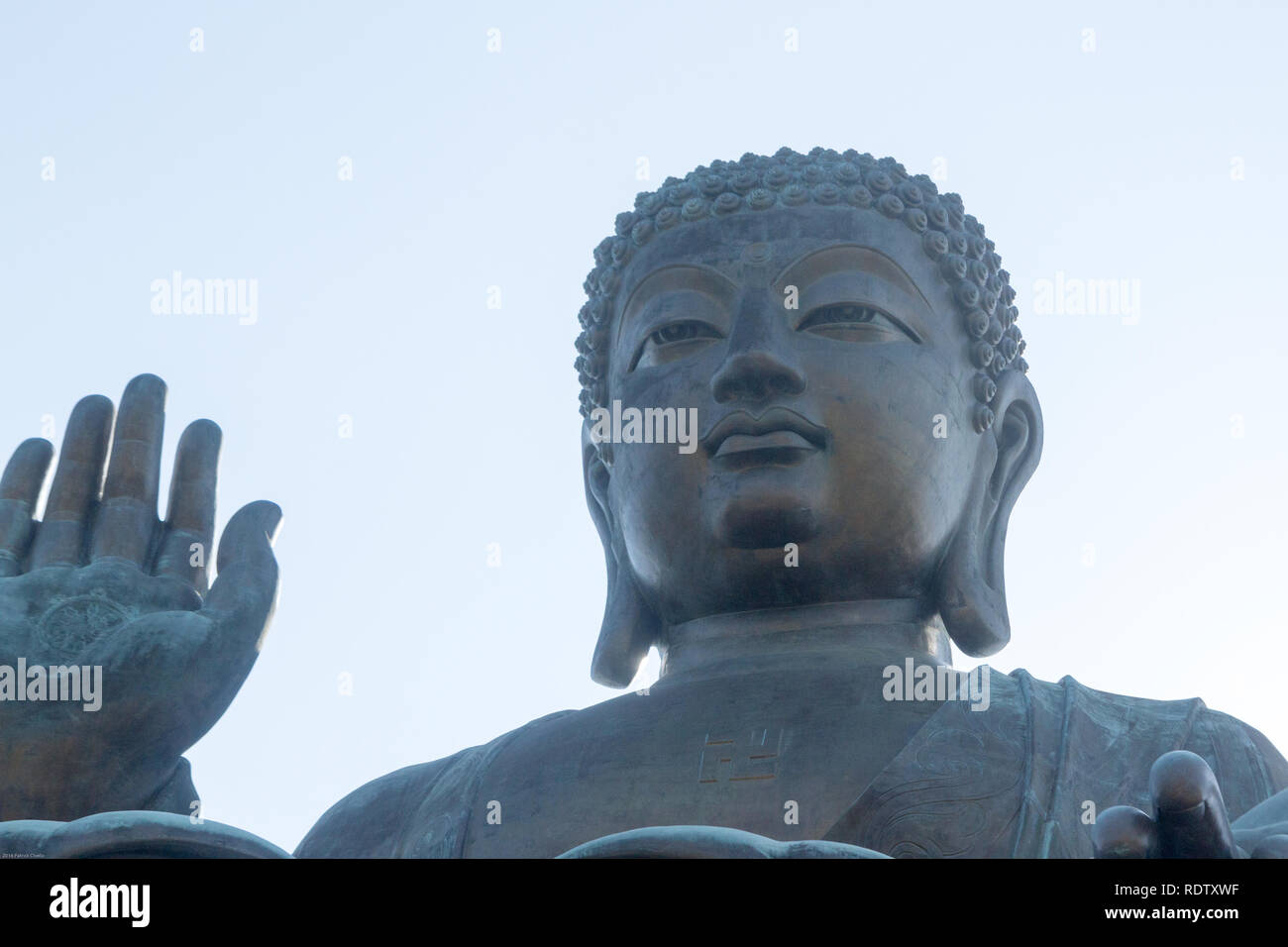 Closeup horizontal photo of the seated, bronze, Tian Tan (Big) Buddha ...